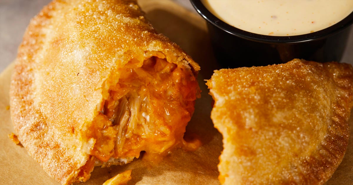 Taco Bell Unveils New Cheesy Chicken Crispanada - ComicBook.com